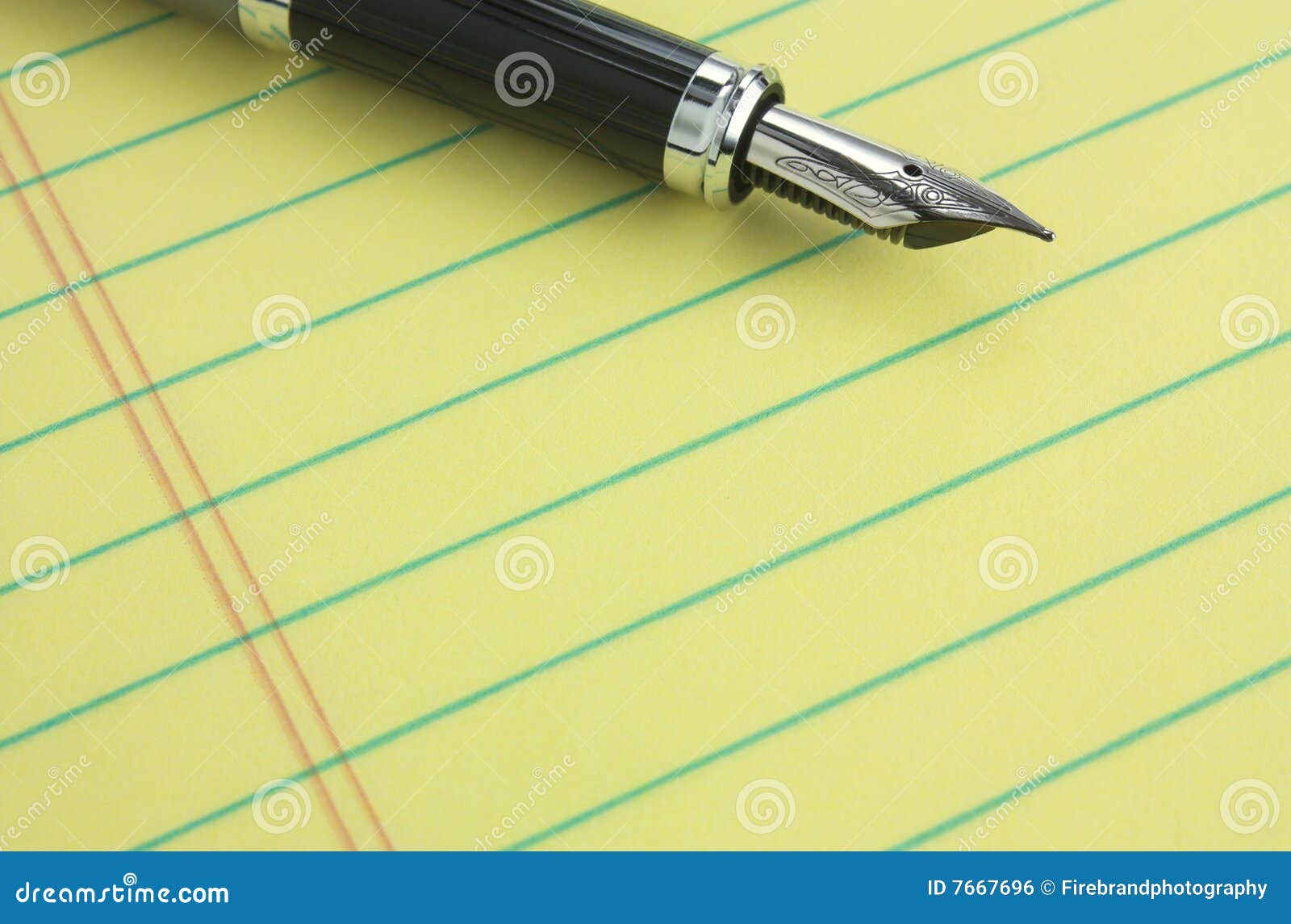 Fountain pen on legal pad stock photo. Image of close - 7667696