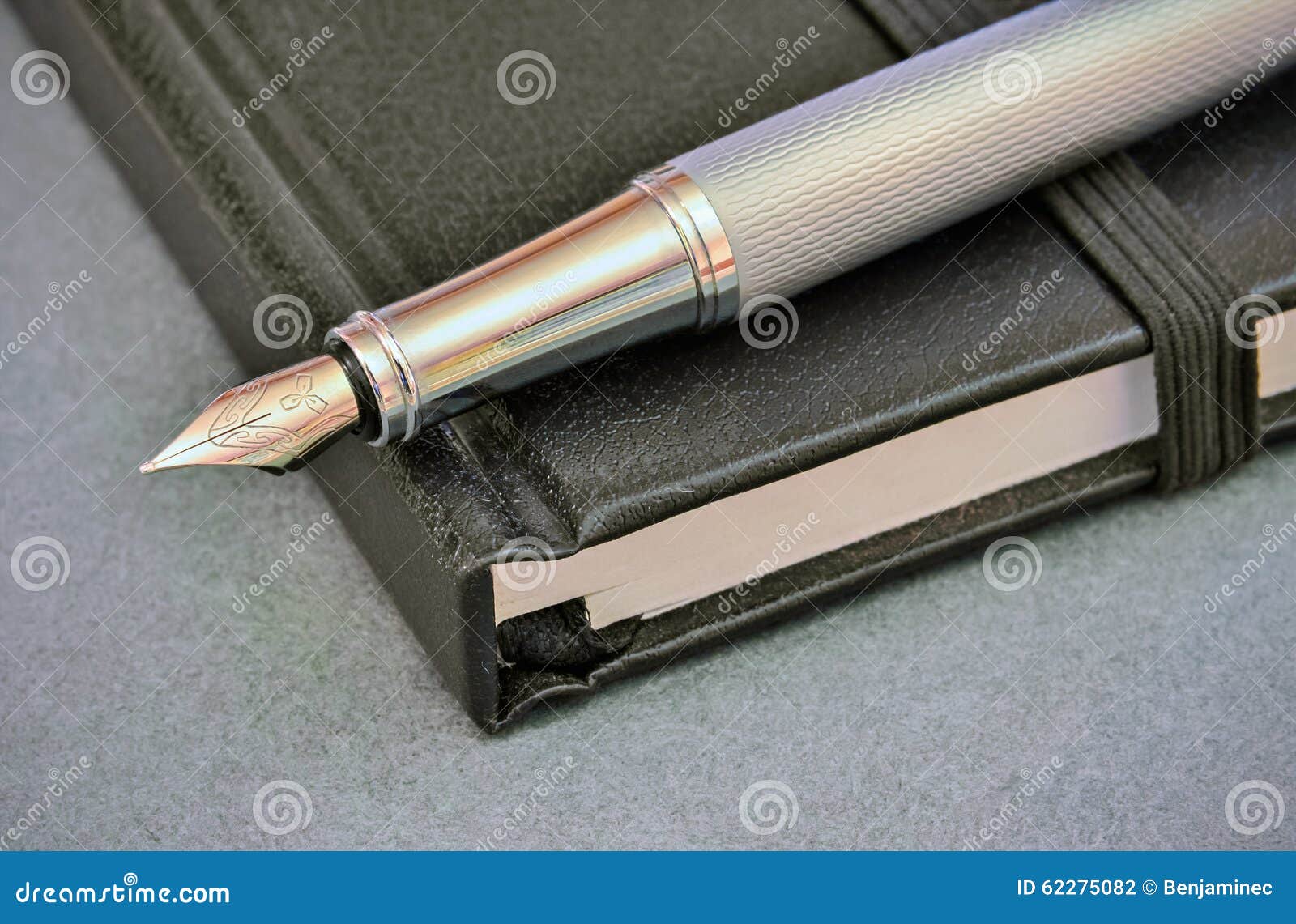 Fountain pen and memo pad stock photo. Image of bookmark - 62275082