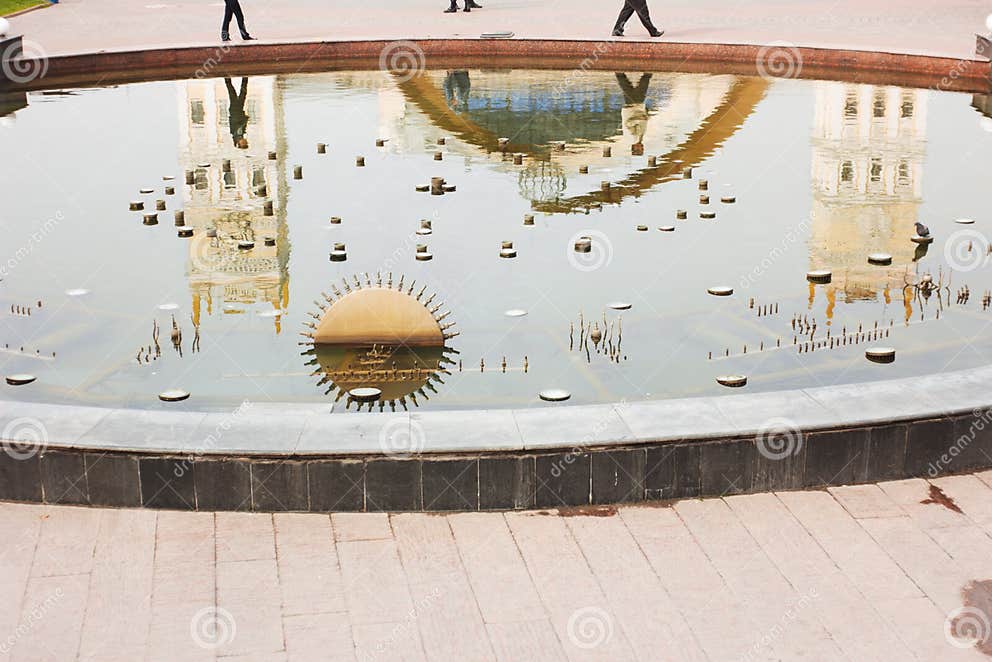 Fountain with reflections stock photo. Image of bird - 46243618