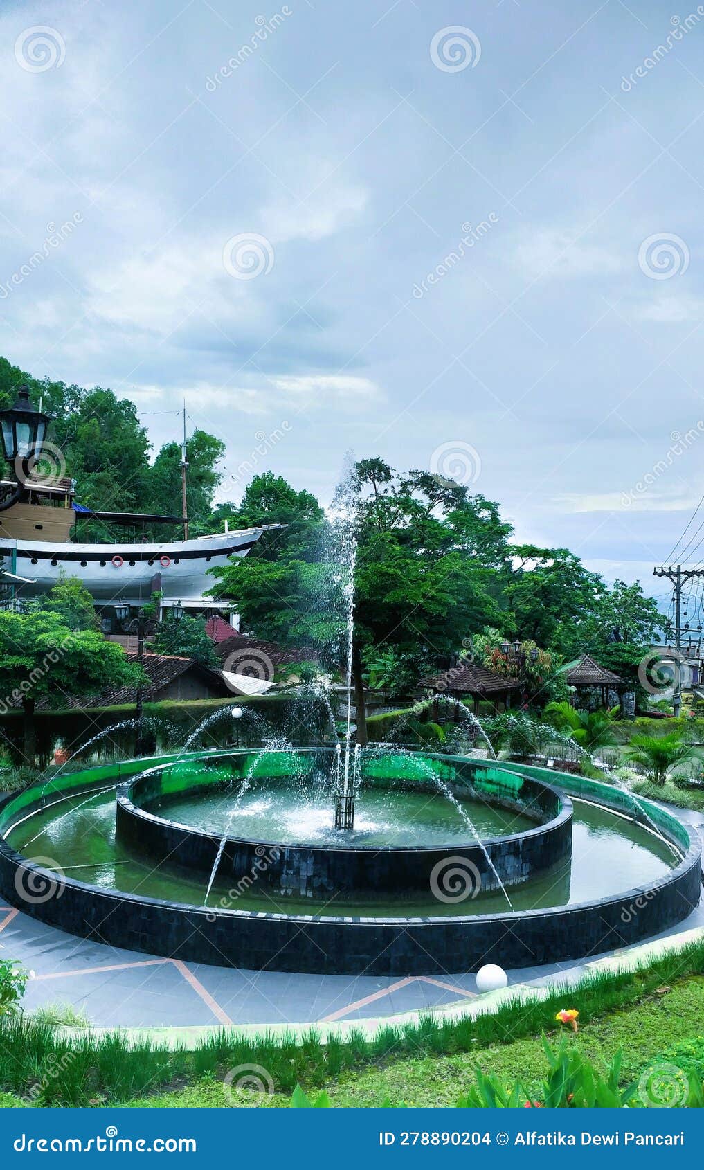 Fountain by the road stock photo. Image of road, landmark - 278890204