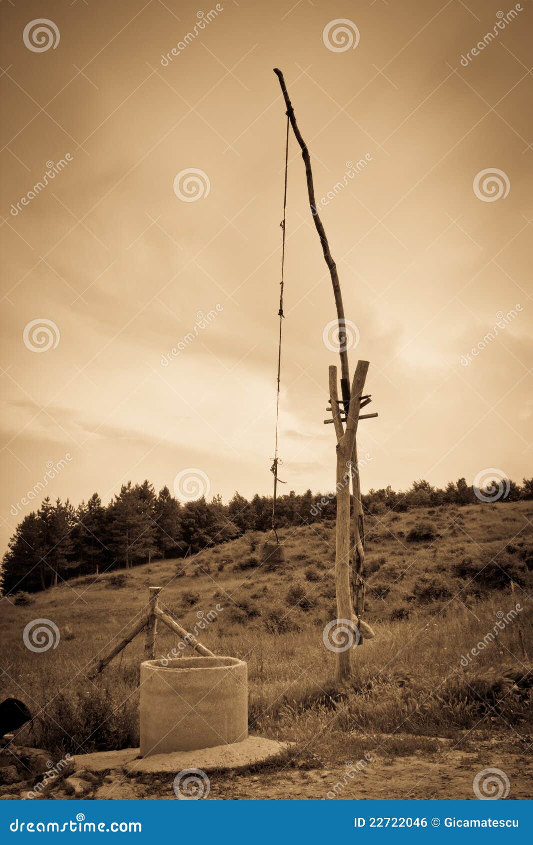 Fountain with shadoof stock photo. Image of concrete - 22722046