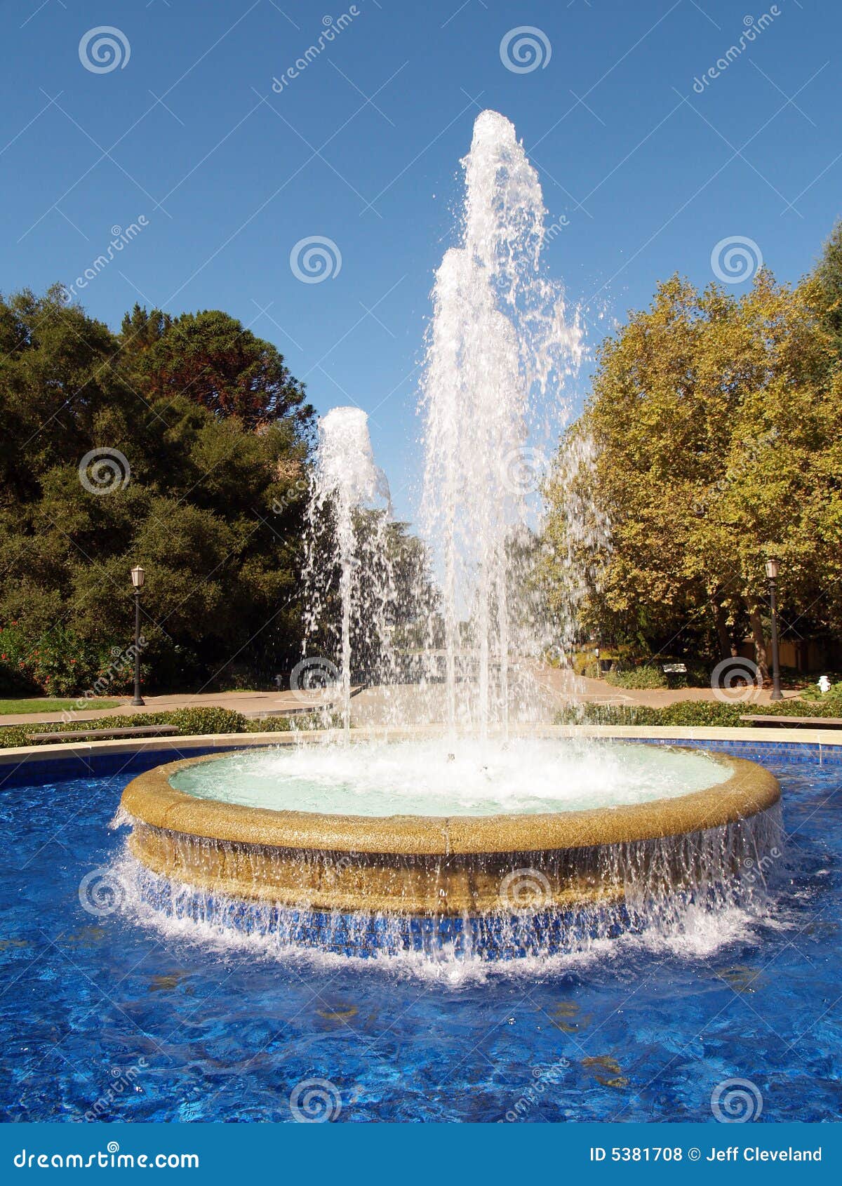Fountain Spraying Up with Pool of Water Stock Photo - Image of spray ...
