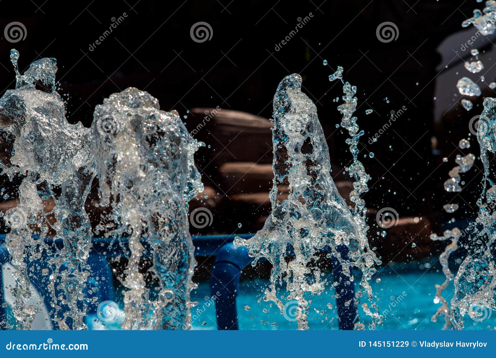 A Fountain Sprays Water Into A Large Pool In A Park In England Royalty ...