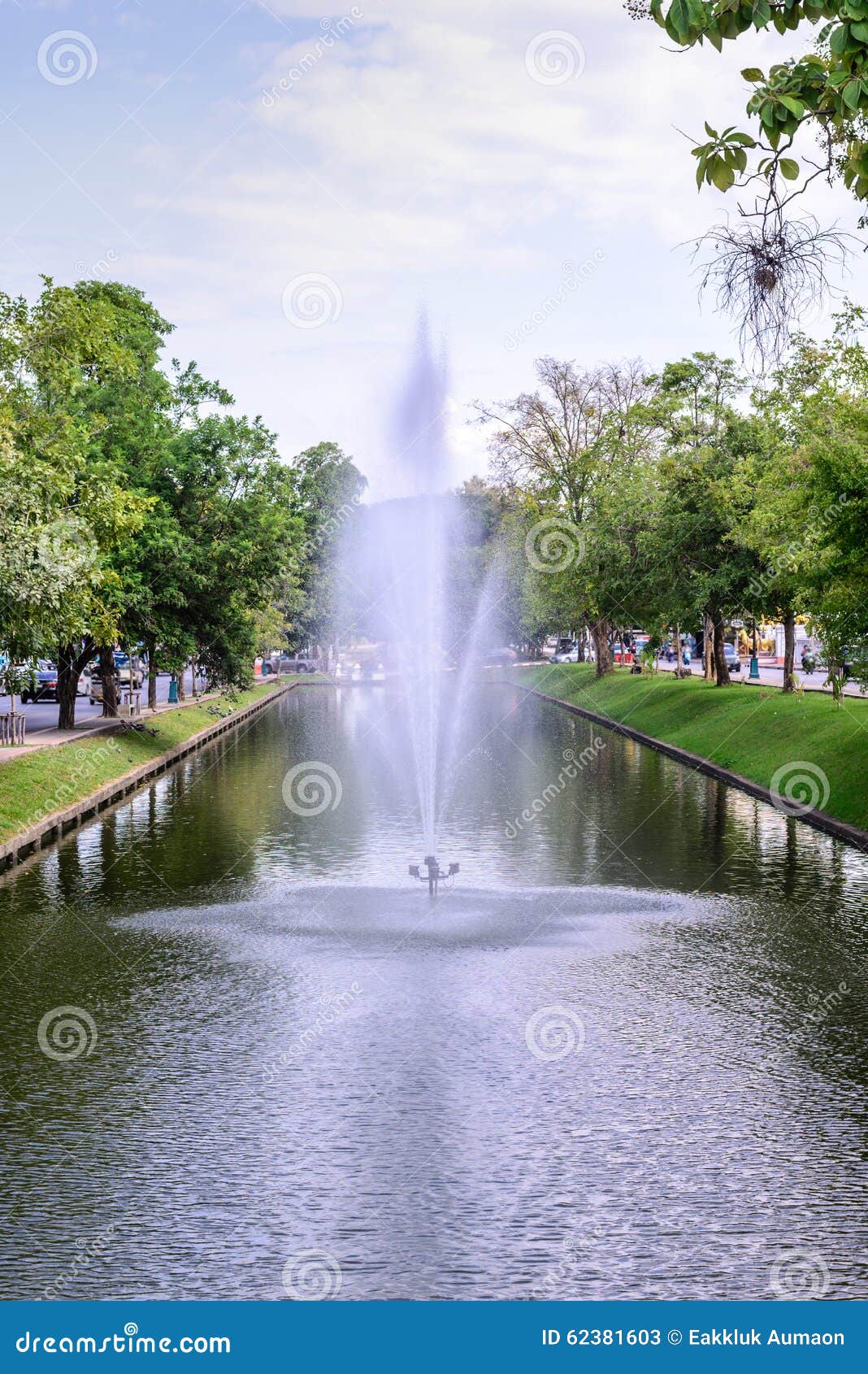 Fountain System in the Middle of Street in the City Stock Image - Image ...