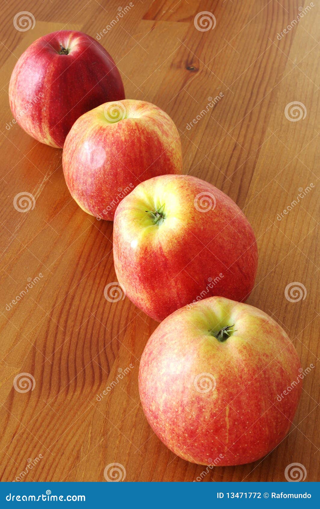 Four apples on the table stock photo. Image of fruit - 13471772