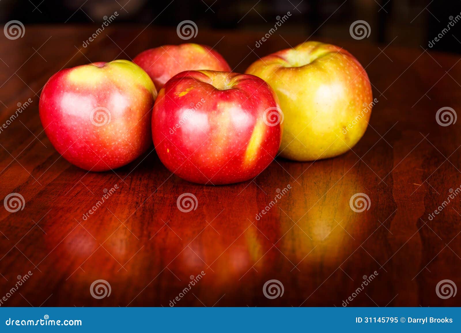 Four Apples on Wood Table stock image. Image of sweet - 31145795
