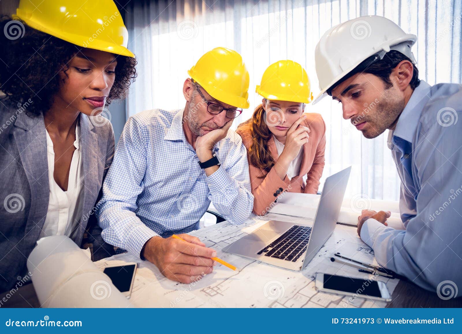 Four Architects Discussing Blueprints in Meeting Stock Image - Image of ...