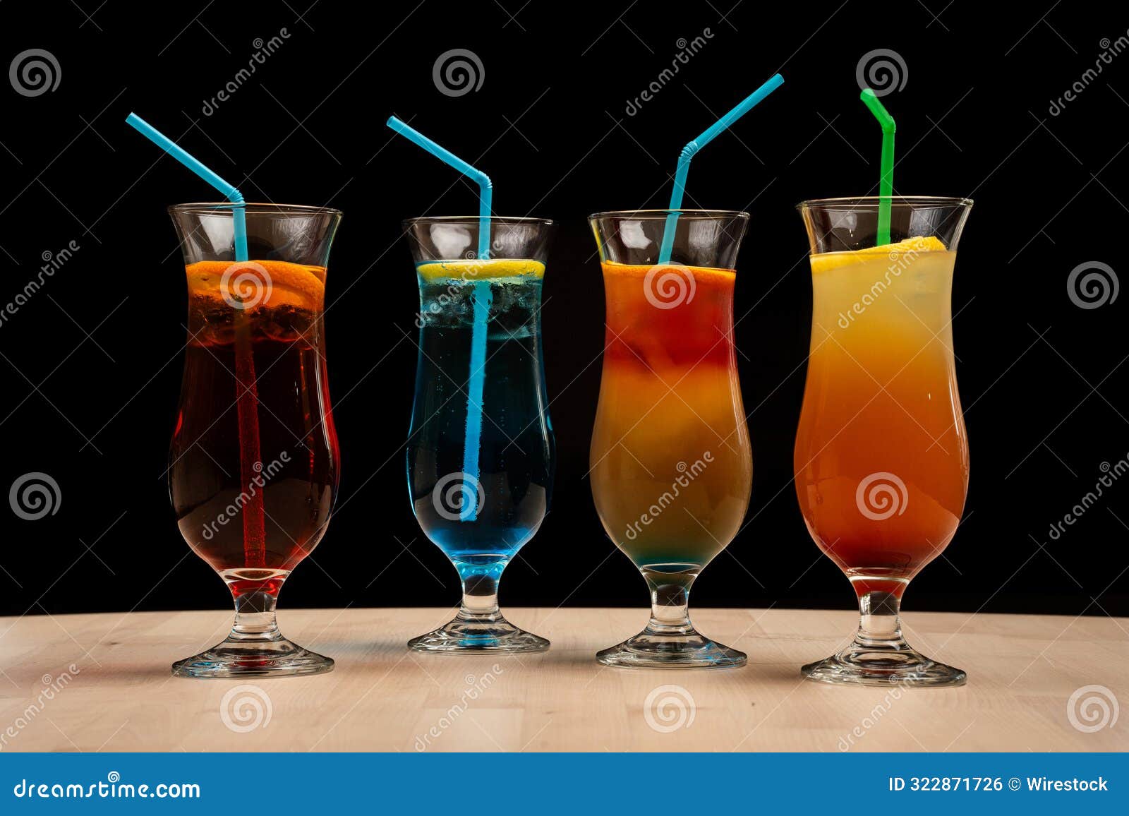 Four Assorted Beverages Arranged in a Line Stock Photo - Image of ...