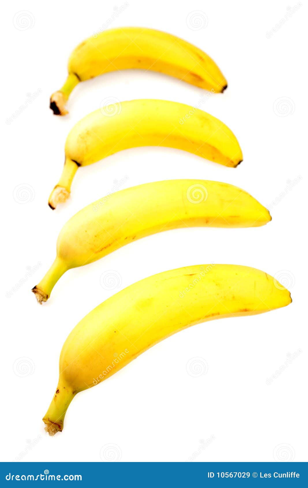 Four Bananas On Wooden Table Royalty-Free Stock Photo | CartoonDealer ...