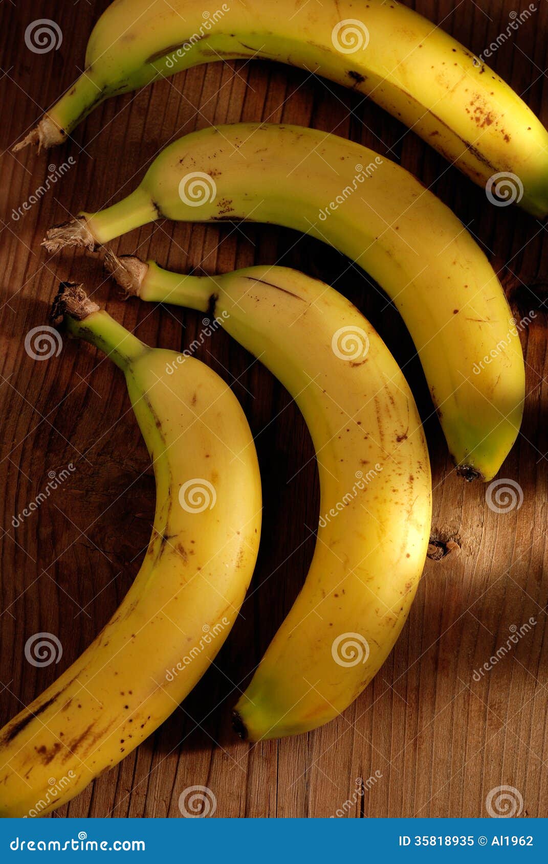 Four bananas on the table stock image. Image of banana - 35818935