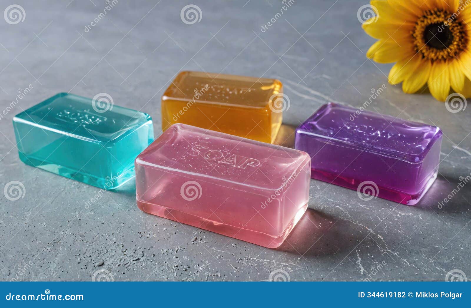 Four Bars of Translucent Soap in Different Colors Sit on a Grey Surface ...