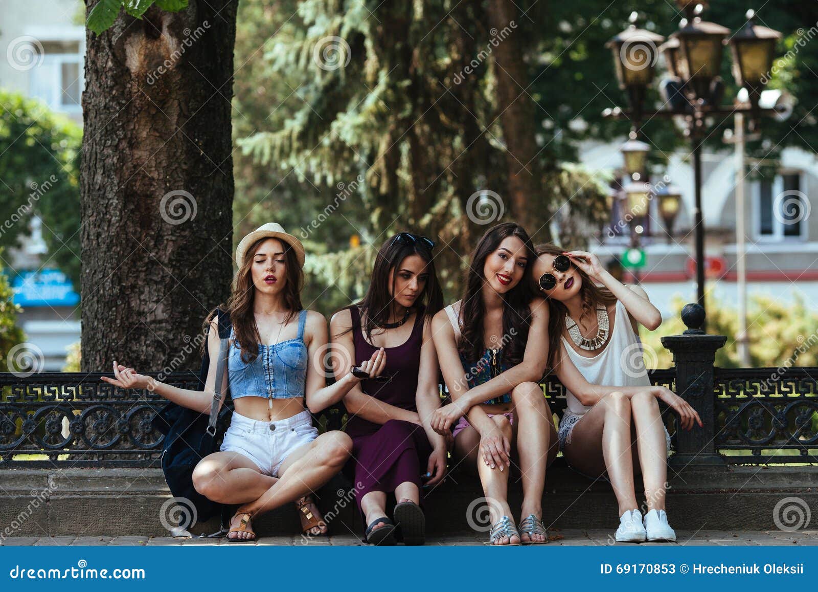 Four beautiful young girls stock image. Image of cute - 69170853