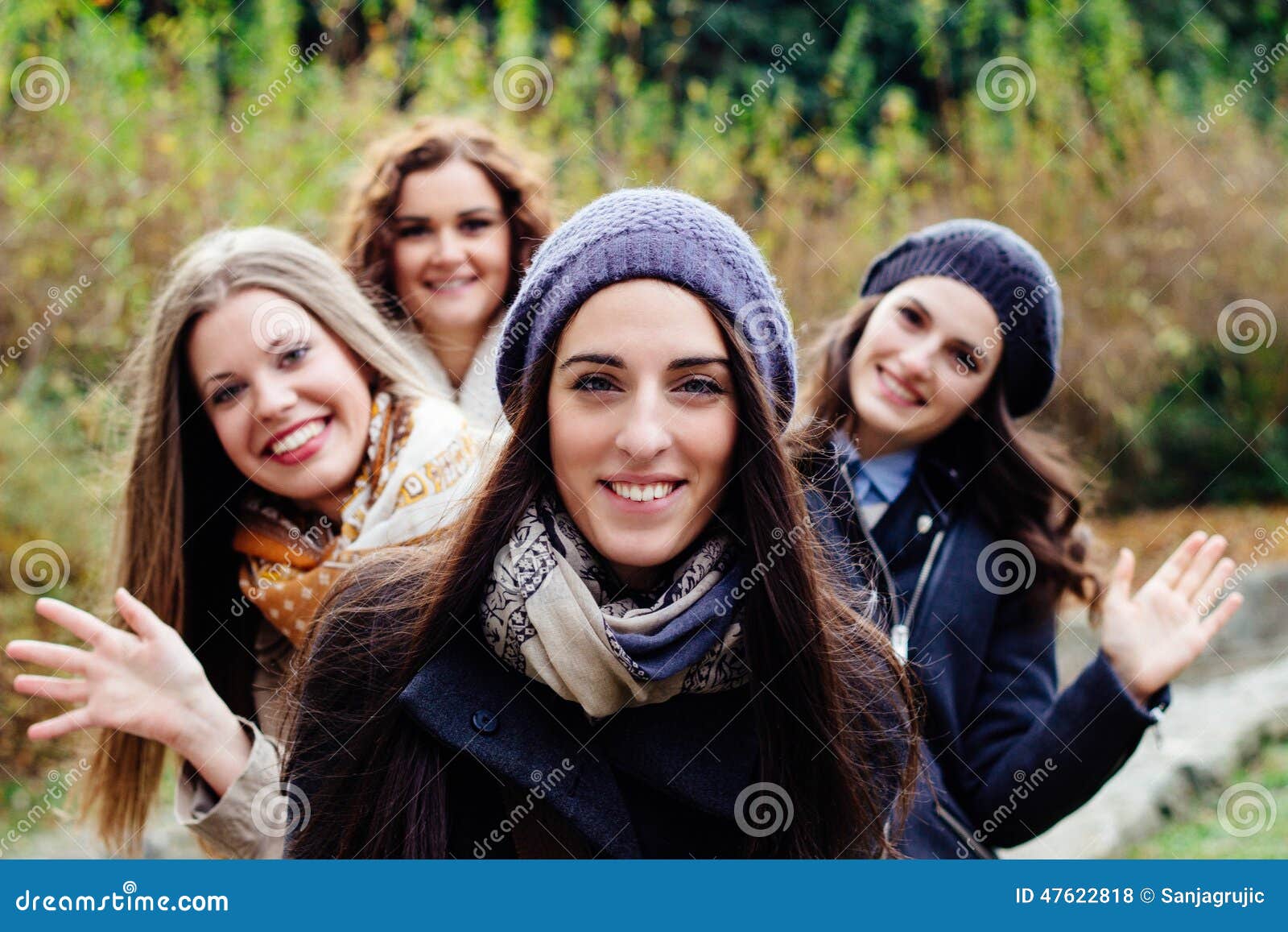 Four Beautiful Young Women Waving Stock Photo - Image of enjoyment ...