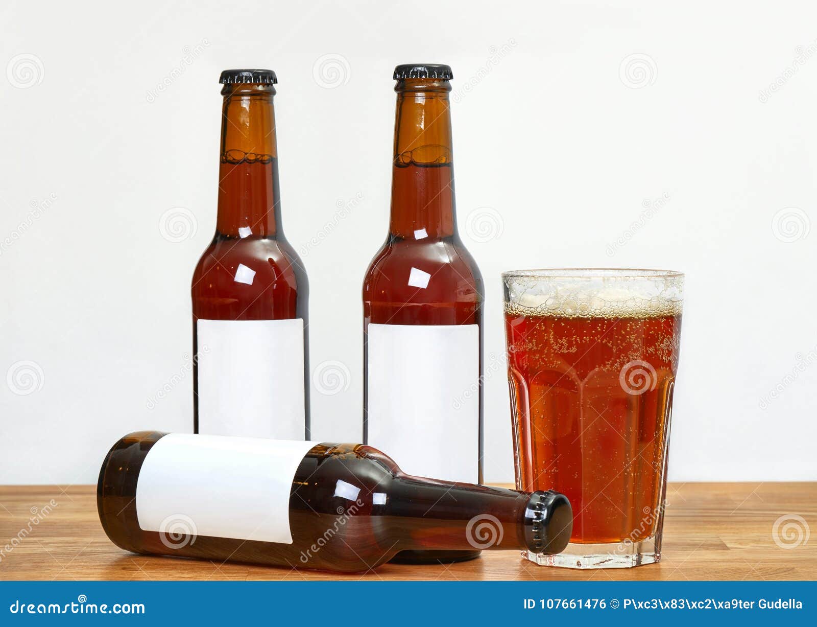 Beer bottles on a table stock photo. Image of craftbeer - 107661476