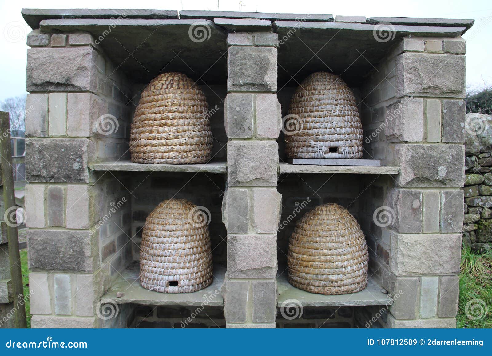 Four Behives in a Stone Structure Stock Image - Image of shelves, stone ...