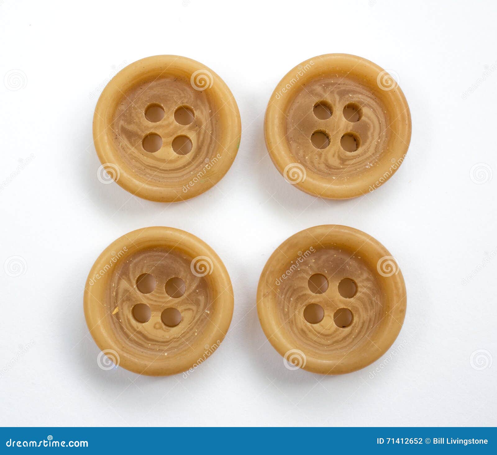 Four Beige Plastic Buttons Isolated on White Stock Photo - Image of ...