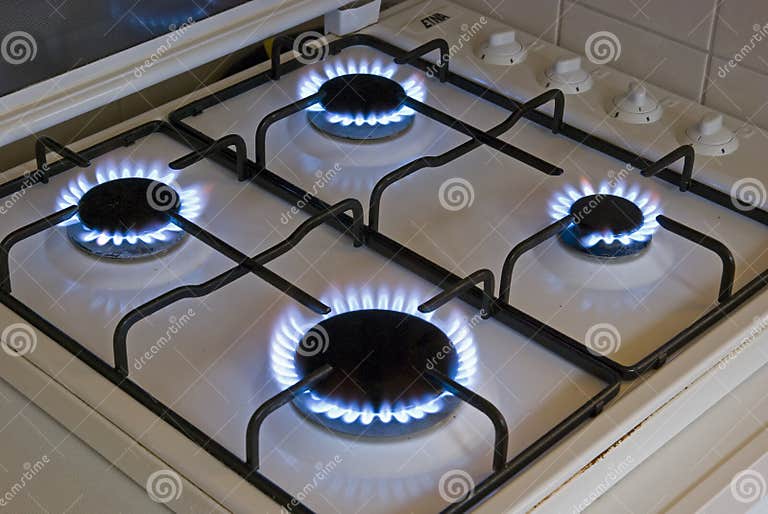 Four blue gas flames stock photo. Image of flaming, burner - 7519376