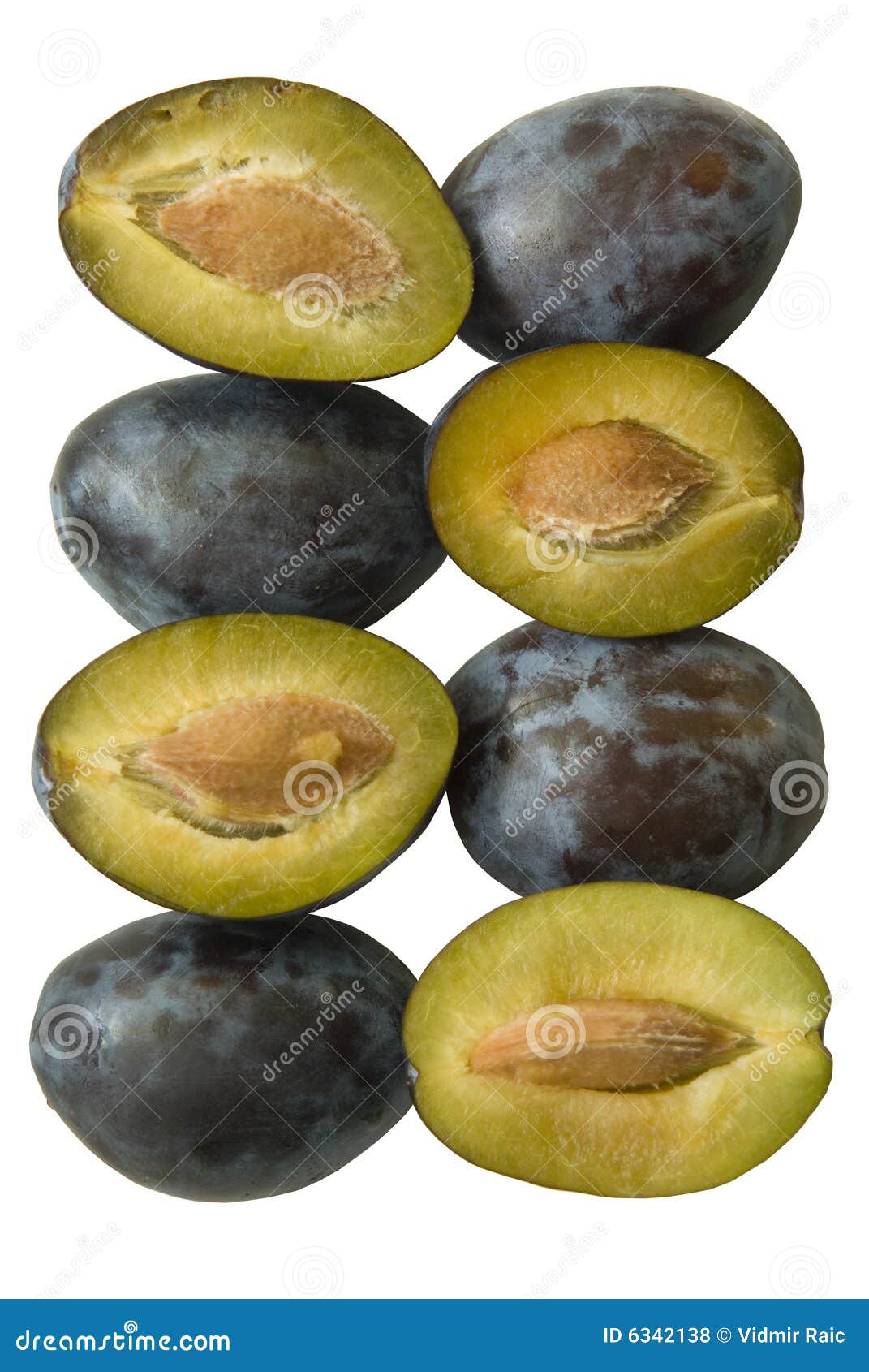 Four Blue Plums And Four Seeds Picture. Image: 6342138