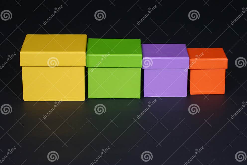 Four boxes stock photo. Image of green, black, colorful - 98798