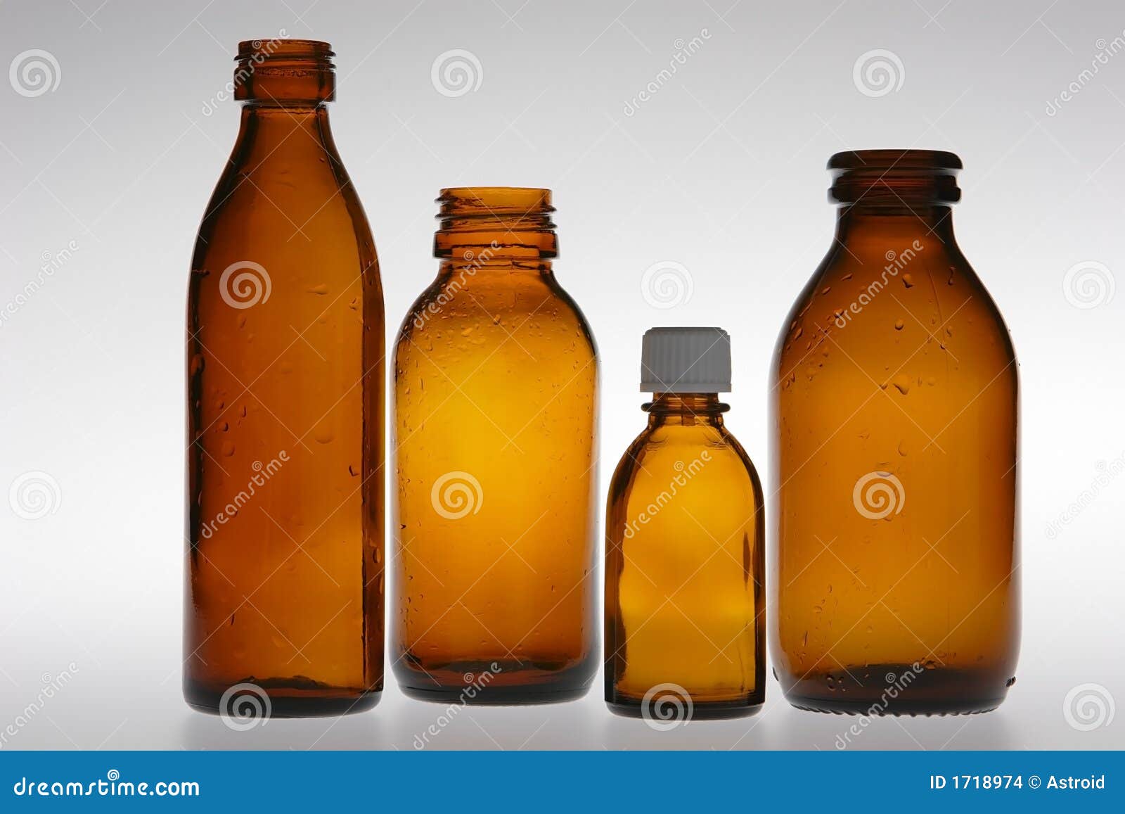 Four Brown Vials stock photo. Image of plastic, brown - 1718974