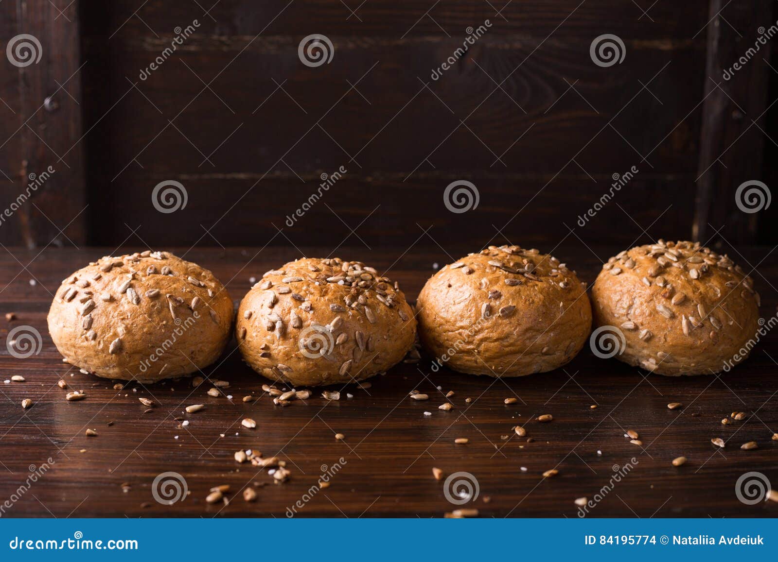 Four Buns With A Marble Texture In The Form Of Heart On A Wooden Table ...