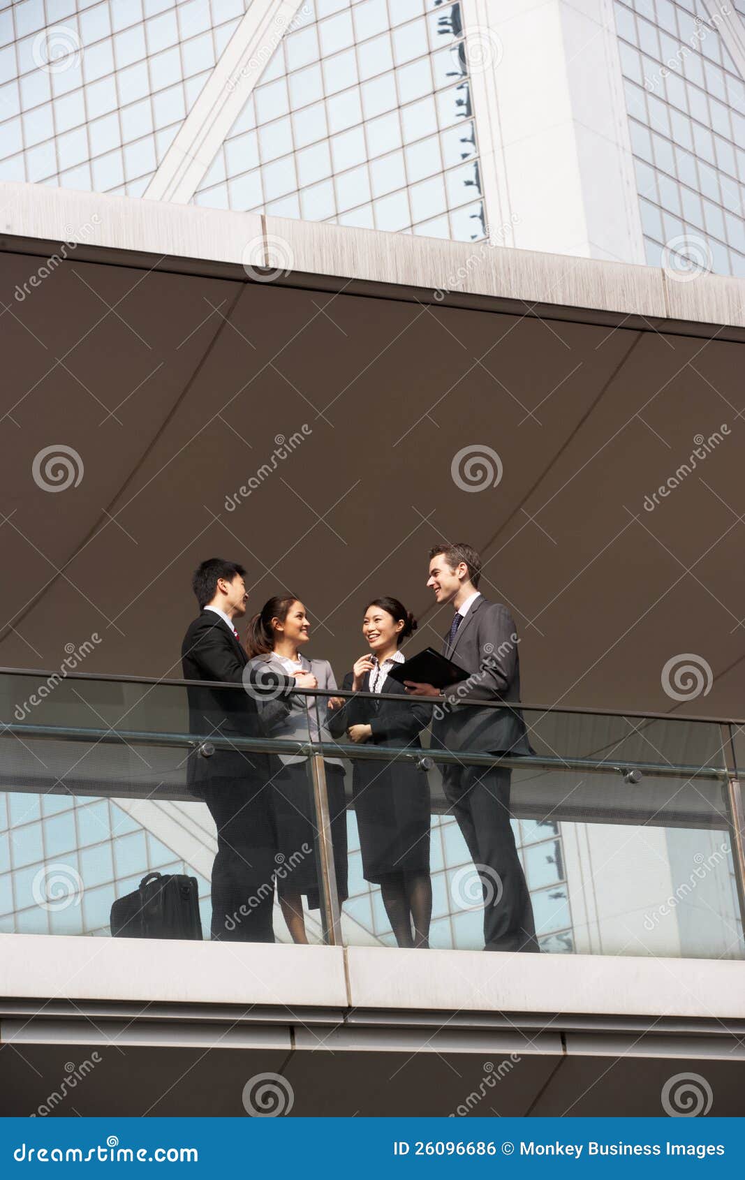 Four Business Colleagues Outside Chatting Stock Photo - Image of life ...