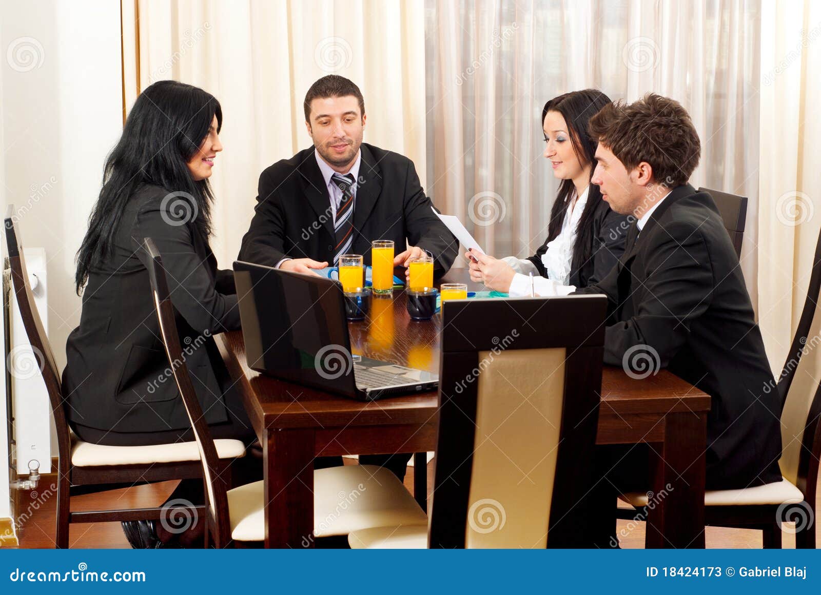 Four Business People in Meeting Stock Image - Image of confident ...