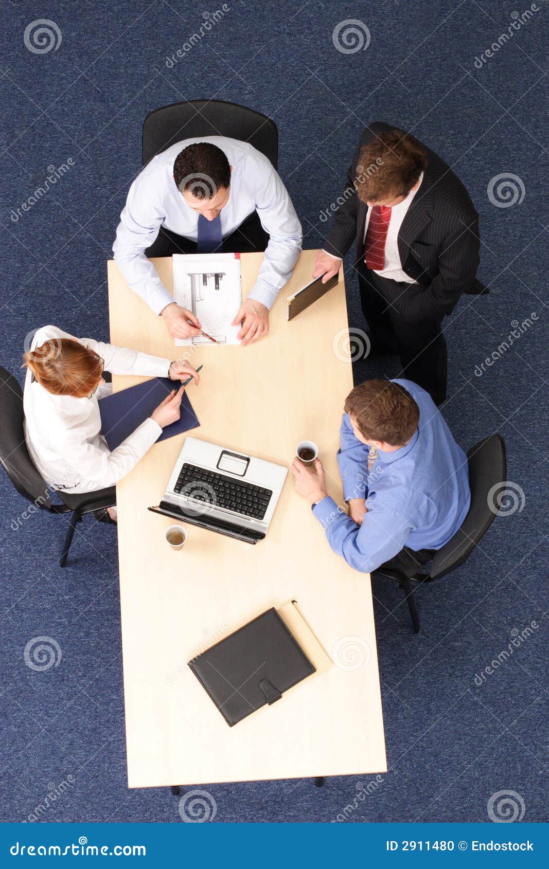 Four Business People Meeting Stock Photo - Image of confer, dynamic ...