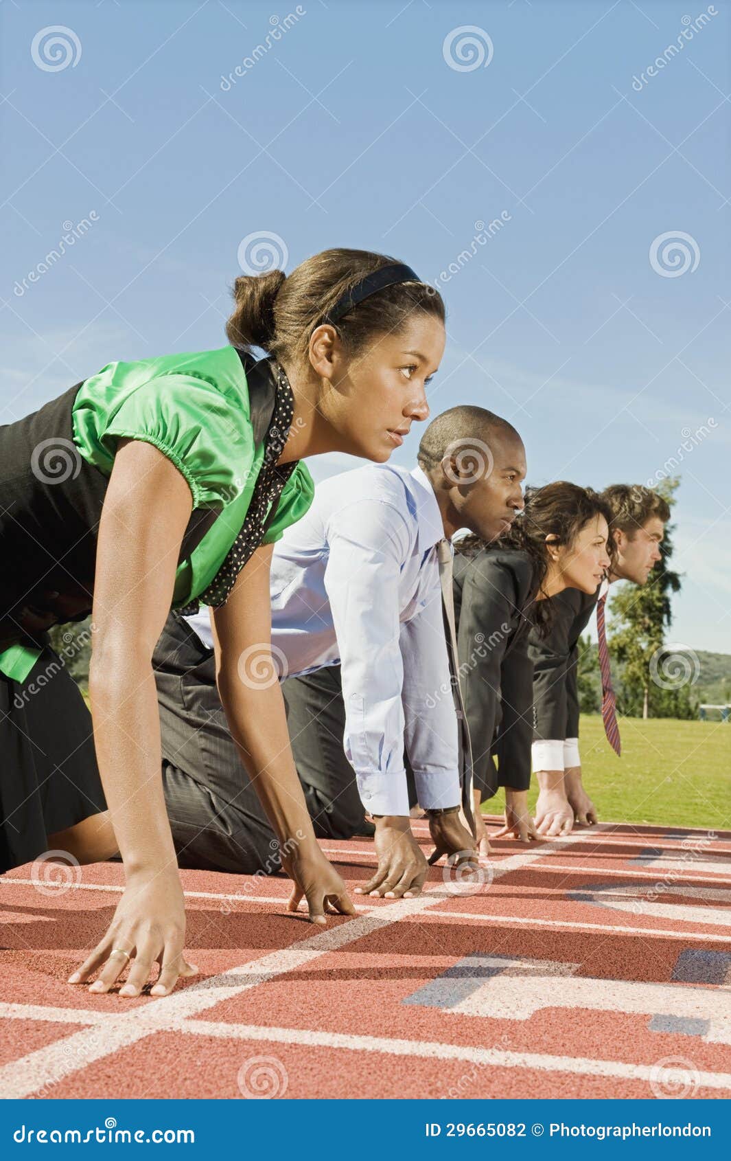 Four Business People at Starting Blocks Stock Photo - Image of ...