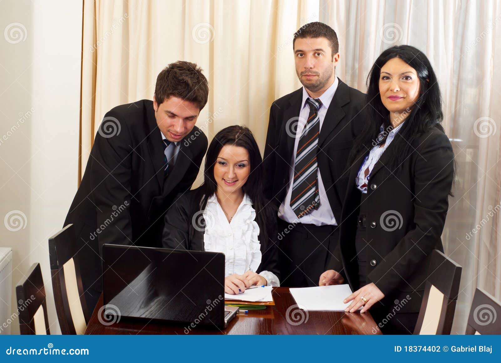 Four Business People Working Stock Photo - Image of looking ...