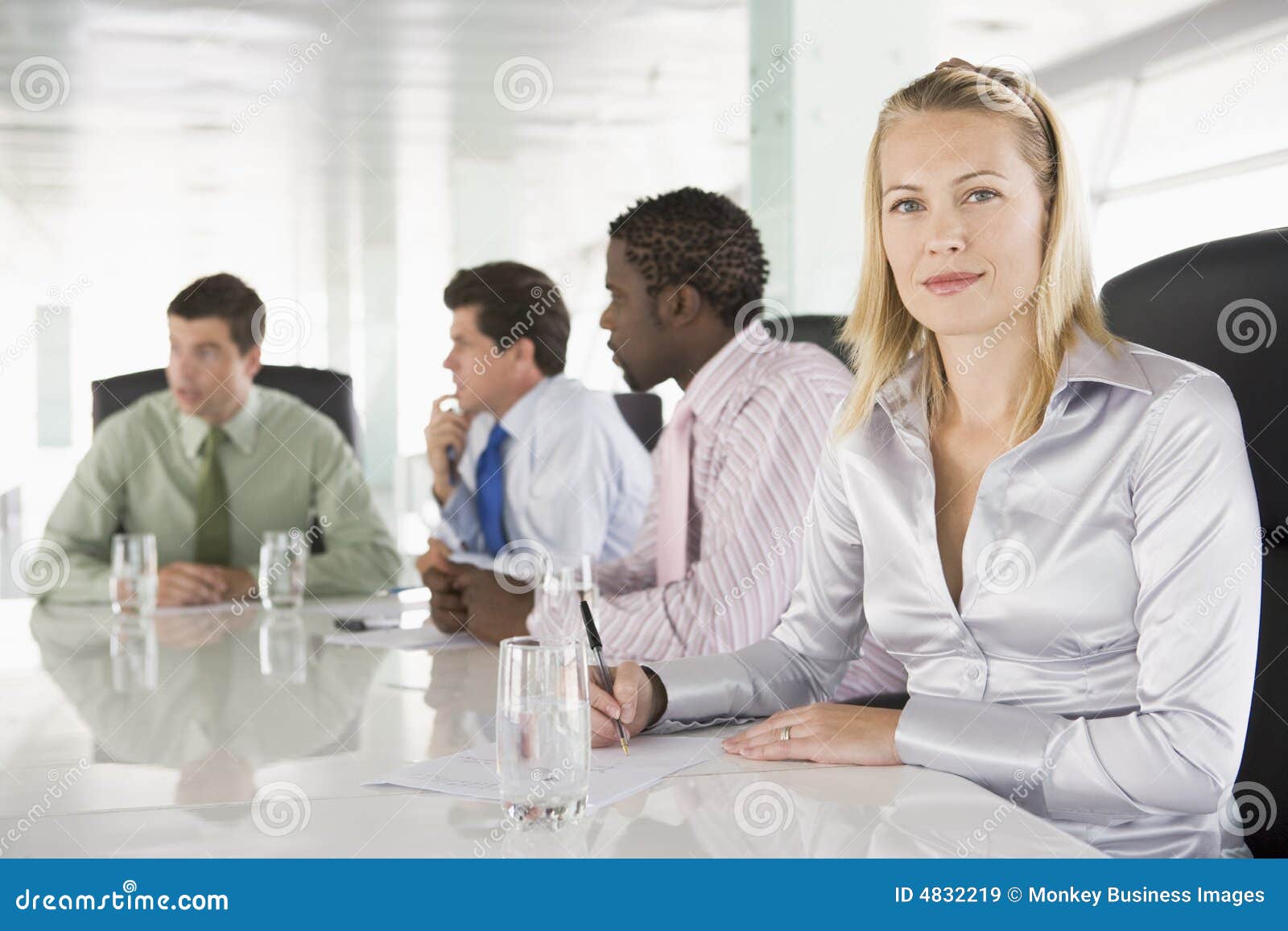 Four Businesspeople Having Meeting Stock Image - Image of businessmen ...