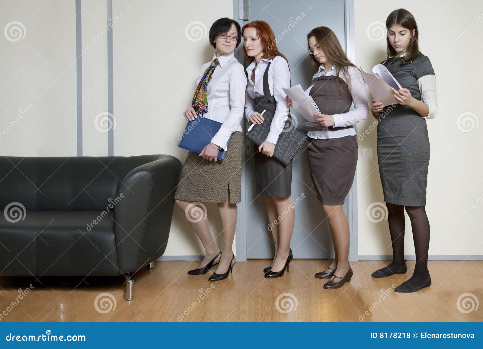 Four Businesswoman Standing in Line Stock Photo - Image of discussion ...