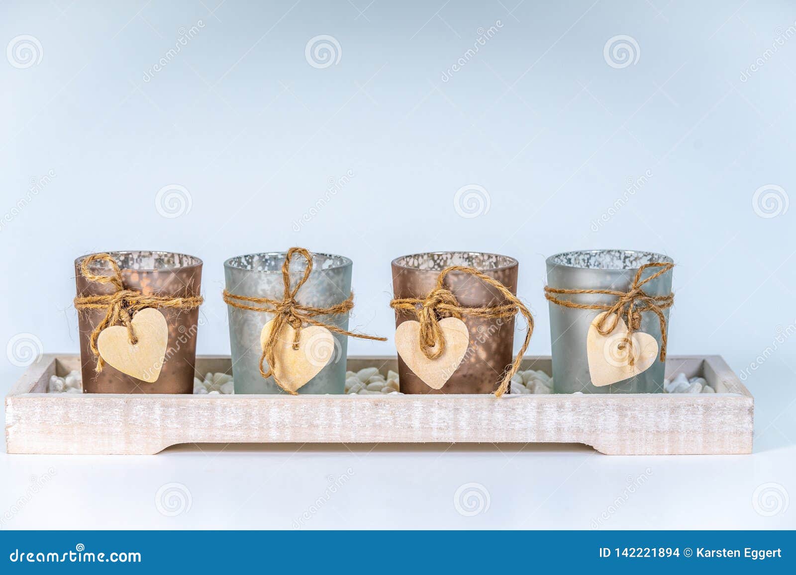 4 Candlesticks Decorated with a Heart Stock Photo - Image of christmas ...