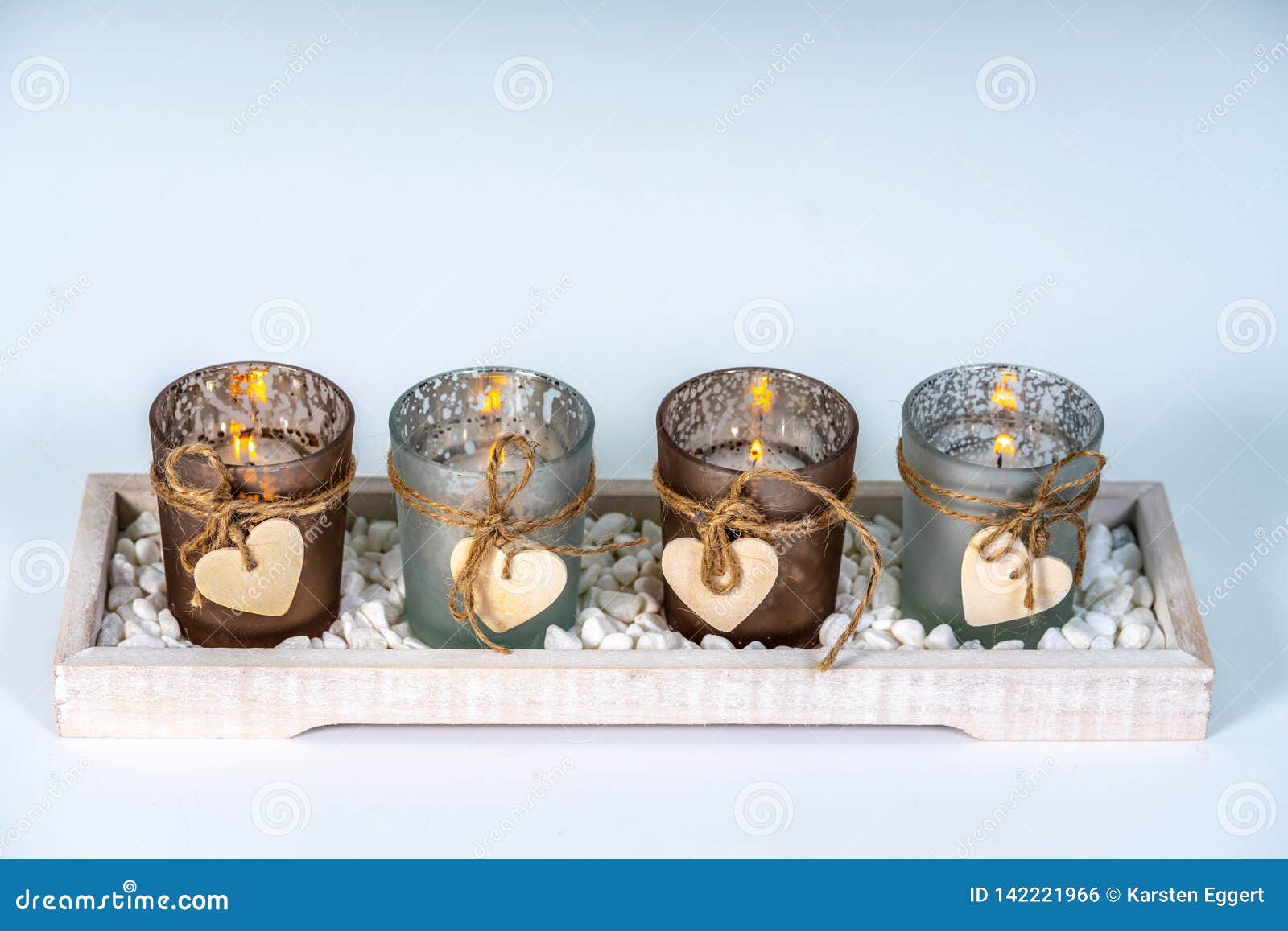 4 Candlesticks Decorated with a Heart Stock Photo - Image of night ...