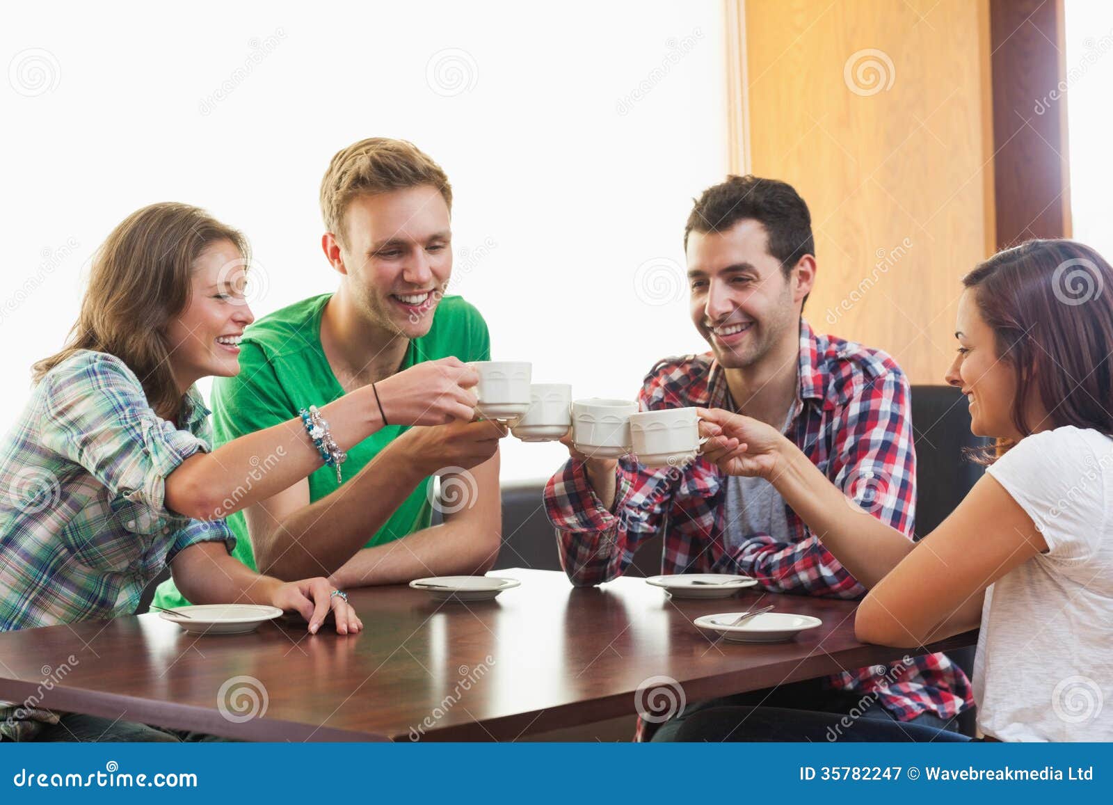 Four Casual Students Drinking a Cup of Coffee Stock Image - Image of ...