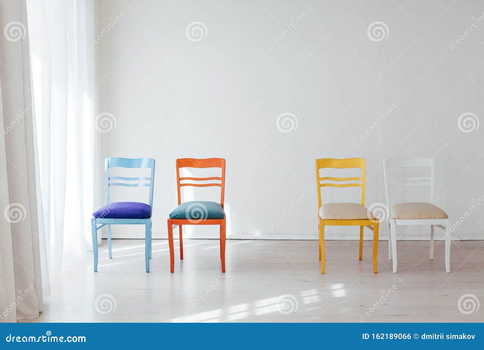 Four Chairs in the Interior of an Empty White Room Stock Photo - Image ...