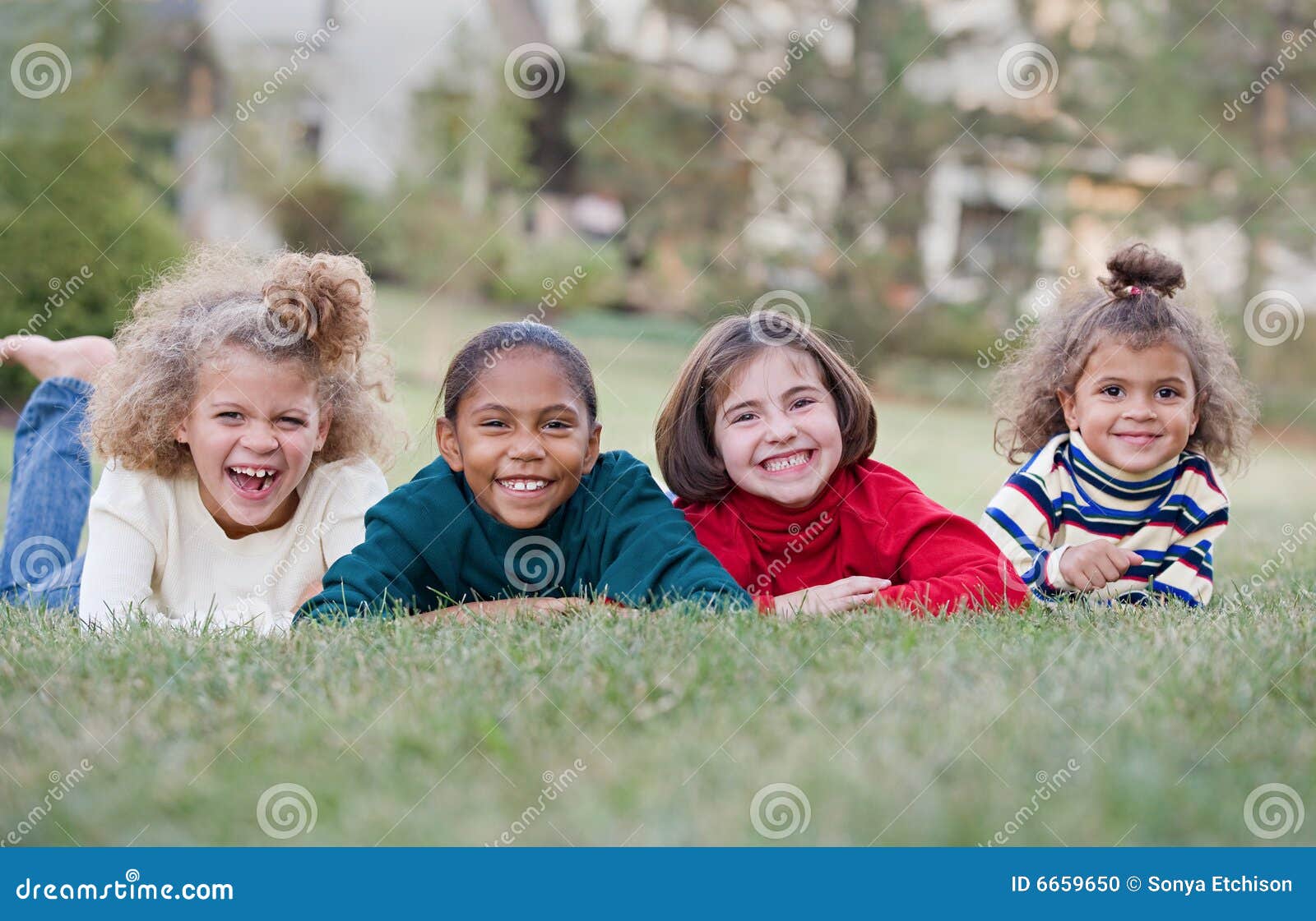 Four Children Laughing stock photo. Image of families - 6659650