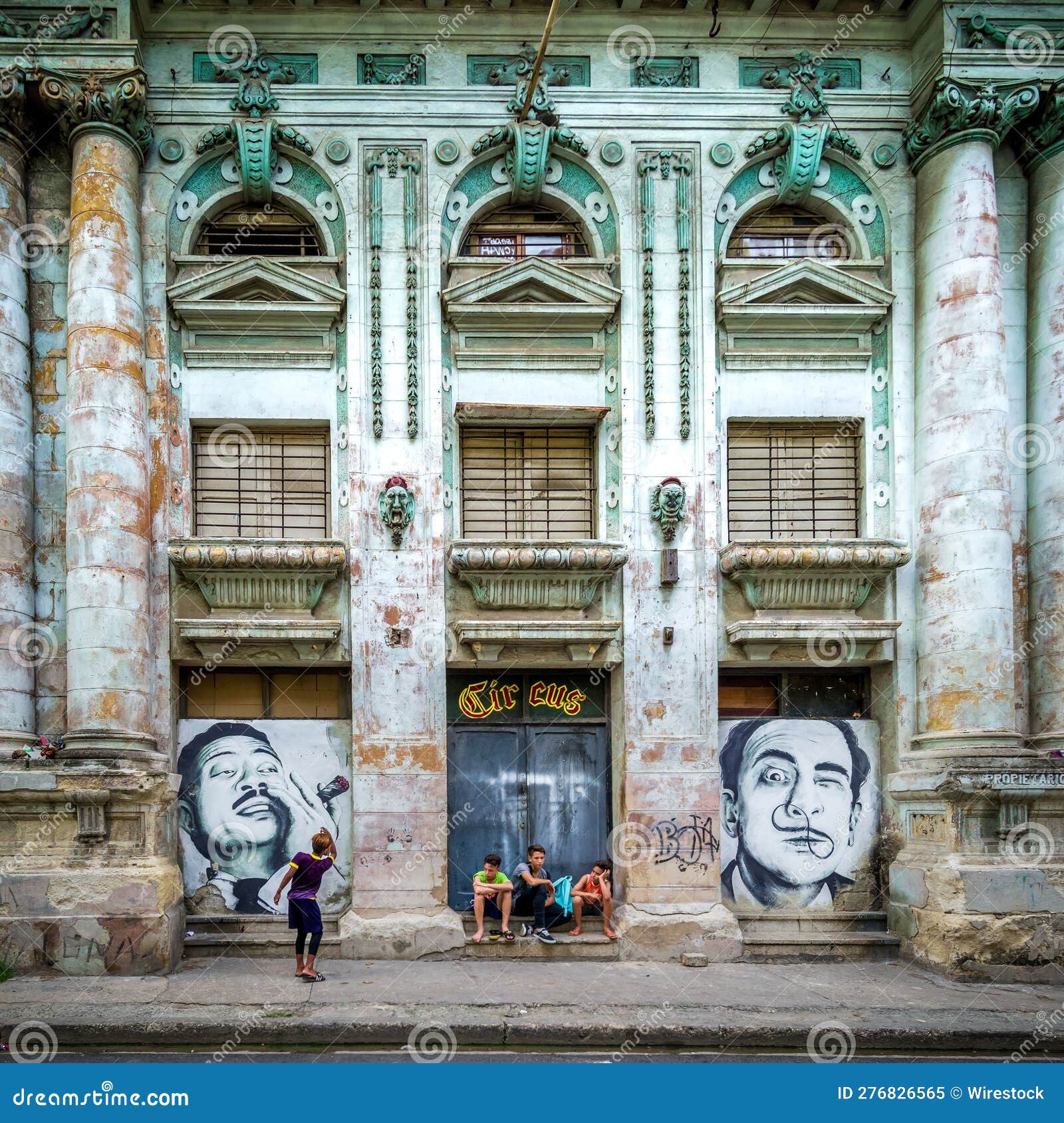 Children Playing in Front of a Huge Old Building with the Circus Sign ...