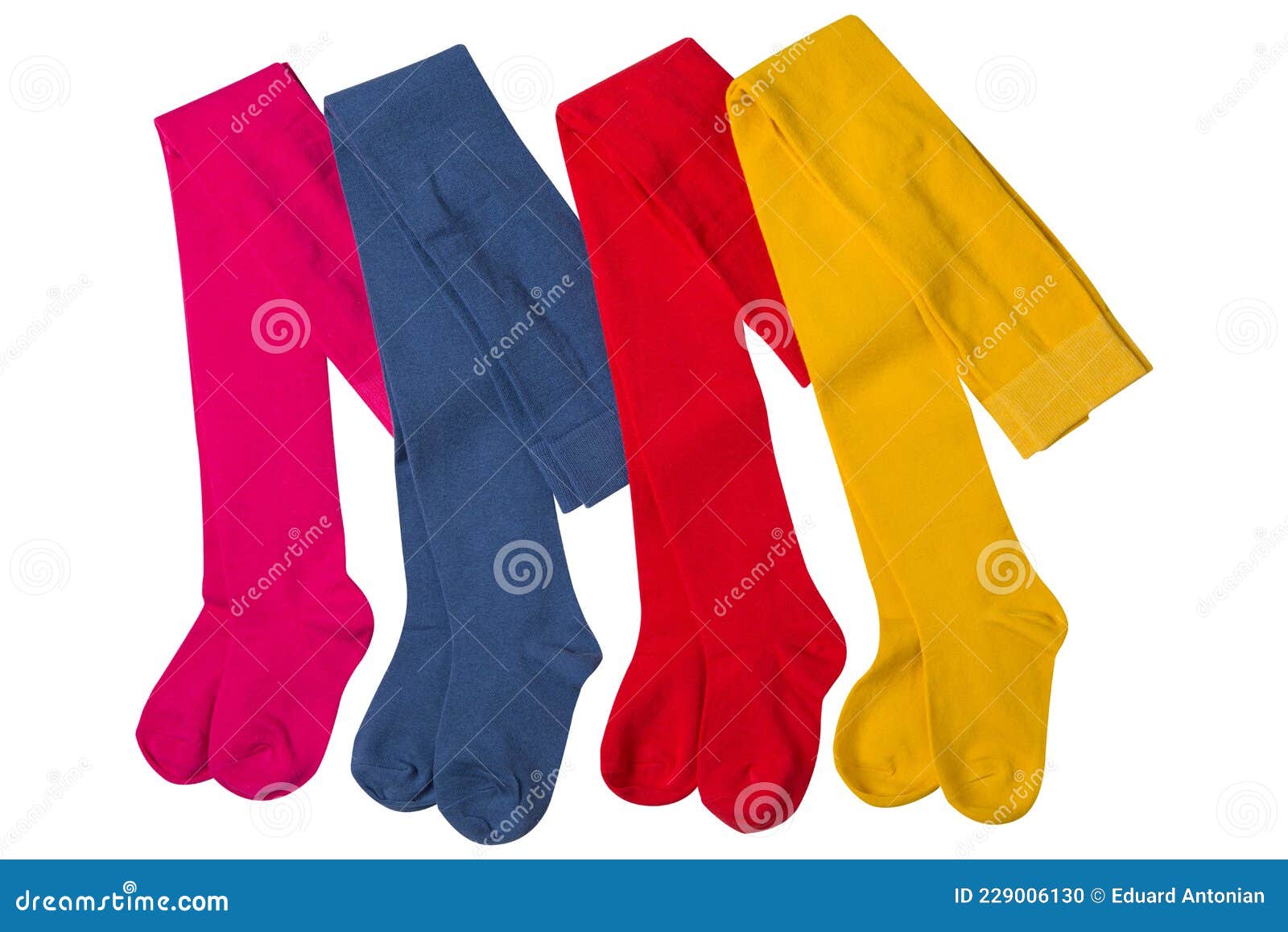 Four Children`s Multi-colored Tights Folded in Half, Lie in a Row, on a ...