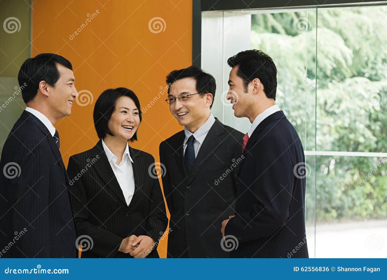 Four Chinese Business Colleagues Stock Photo - Image of environment ...