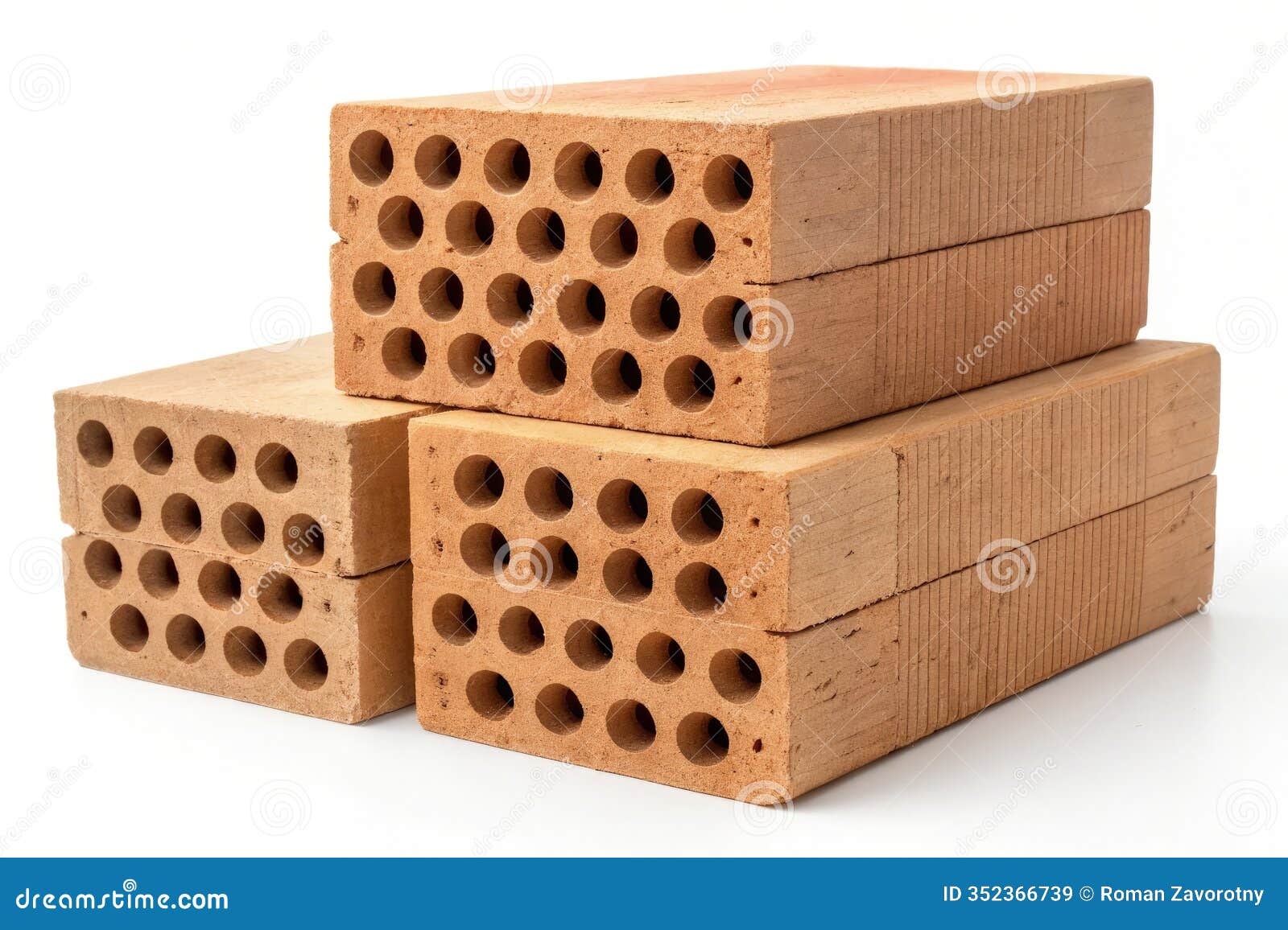 Stack of Four Clay Bricks with Hole Pattern on White Background ...