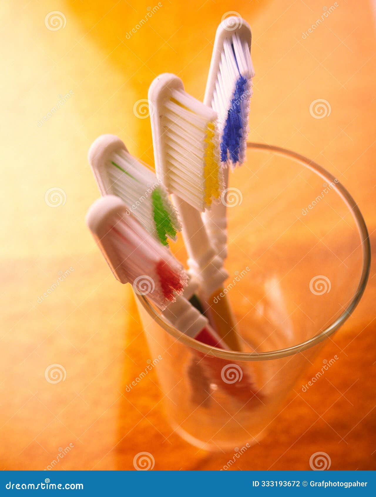 Four Clean Toothbrushes in a Glass Stock Photo - Image of teeth ...