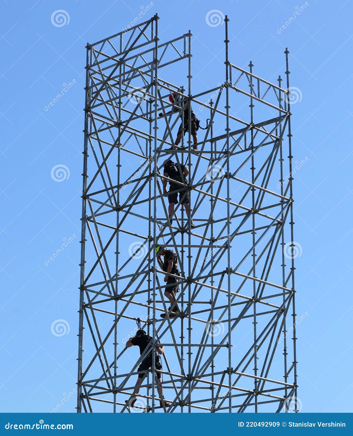 Four Climbers Riggers on a High Metal Structure Stock Image - Image of ...