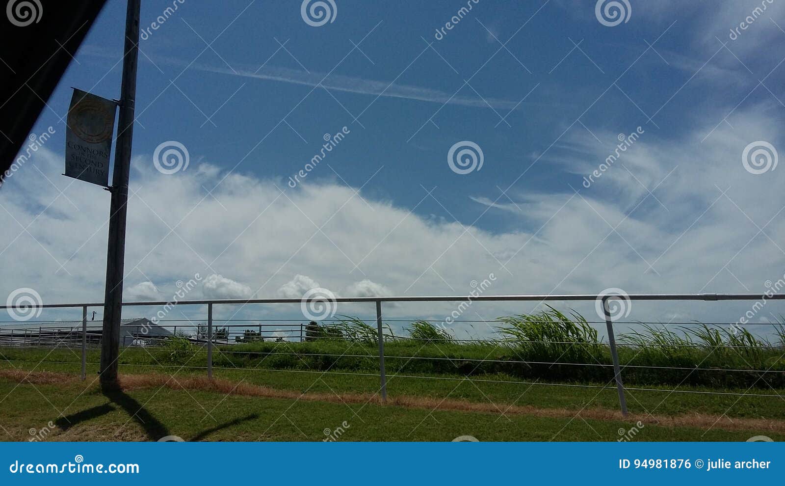 Four clouds in a row editorial photo. Image of grass - 94981876