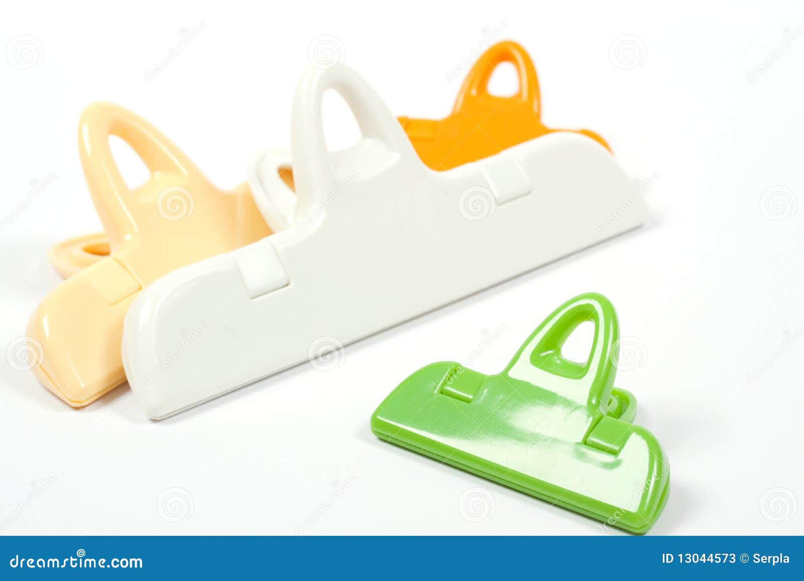 Four color plastic clips stock image. Image of shot, clips - 13044573