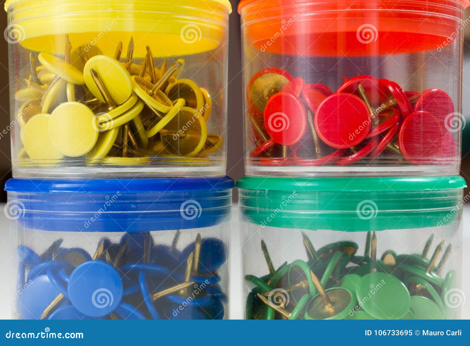 Four Colored Thumbtack Boxes Stock Image - Image of blue, colorful ...