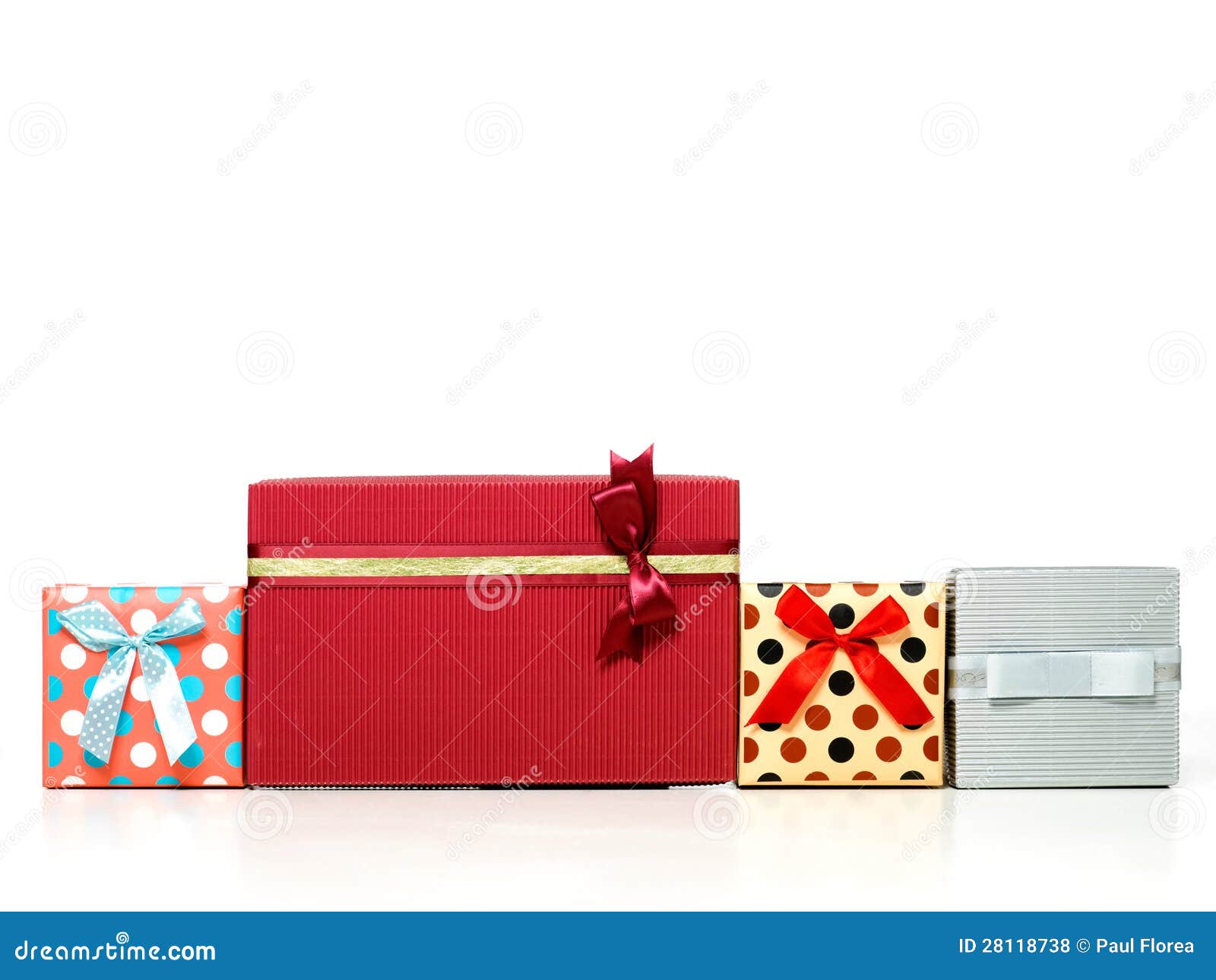 Four Colorful Presents in a Row Stock Photo - Image of package ...