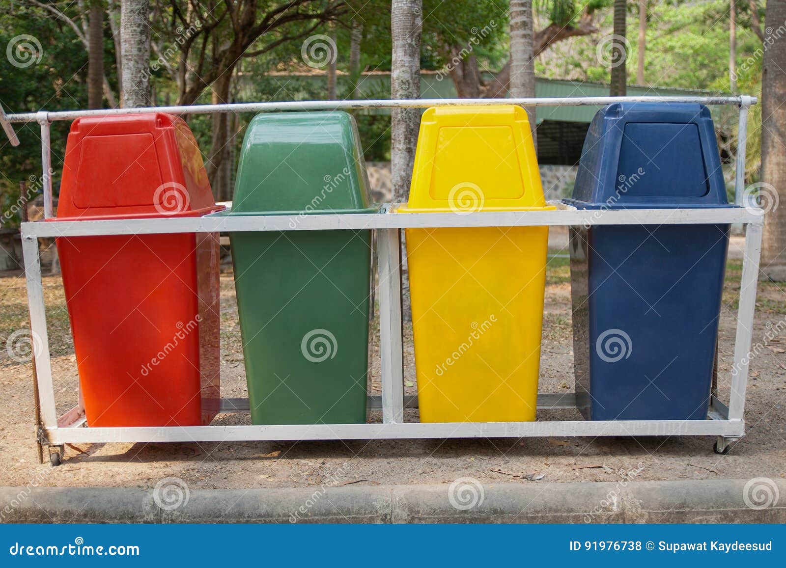 Four colorful recycle bins stock photo. Image of environment - 91976738