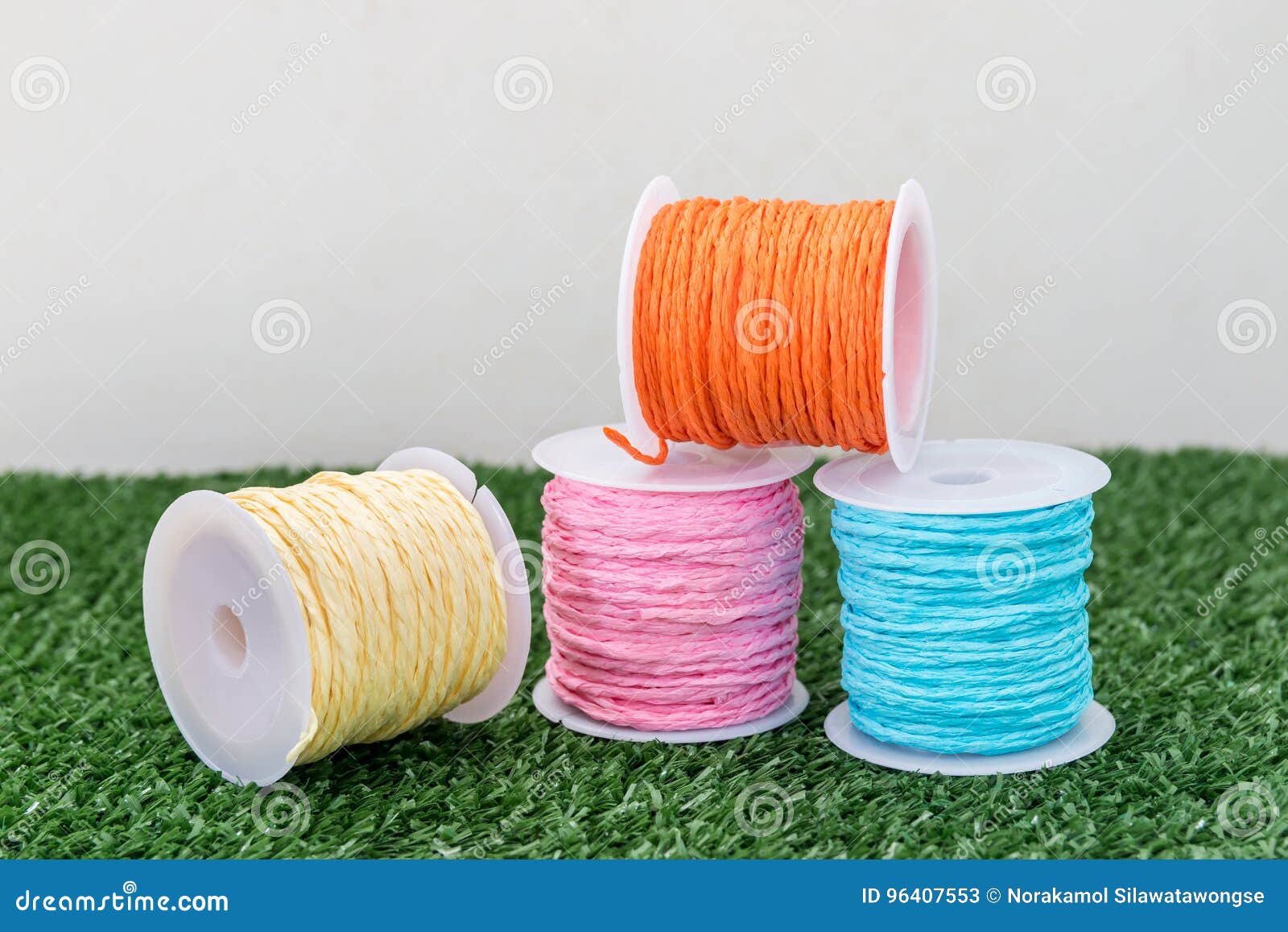 Four of Colorful Thread on Grass with White Background Stock Image ...