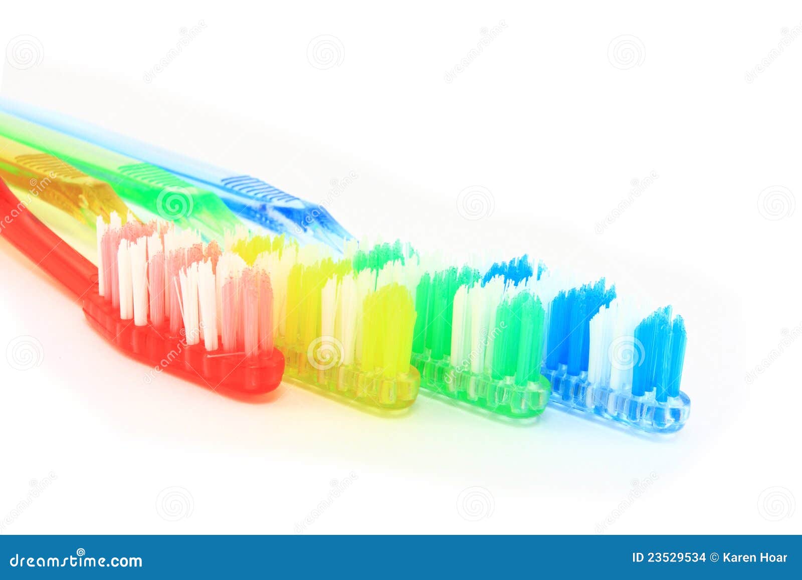 Colorful Toothbrushes In The Form Of Cartoon Characters On A Blue ...